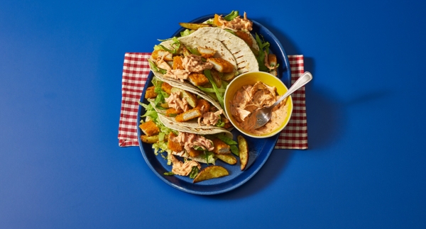 Fab fish finger and chip tacos with crunchy coleslaw and lettuce